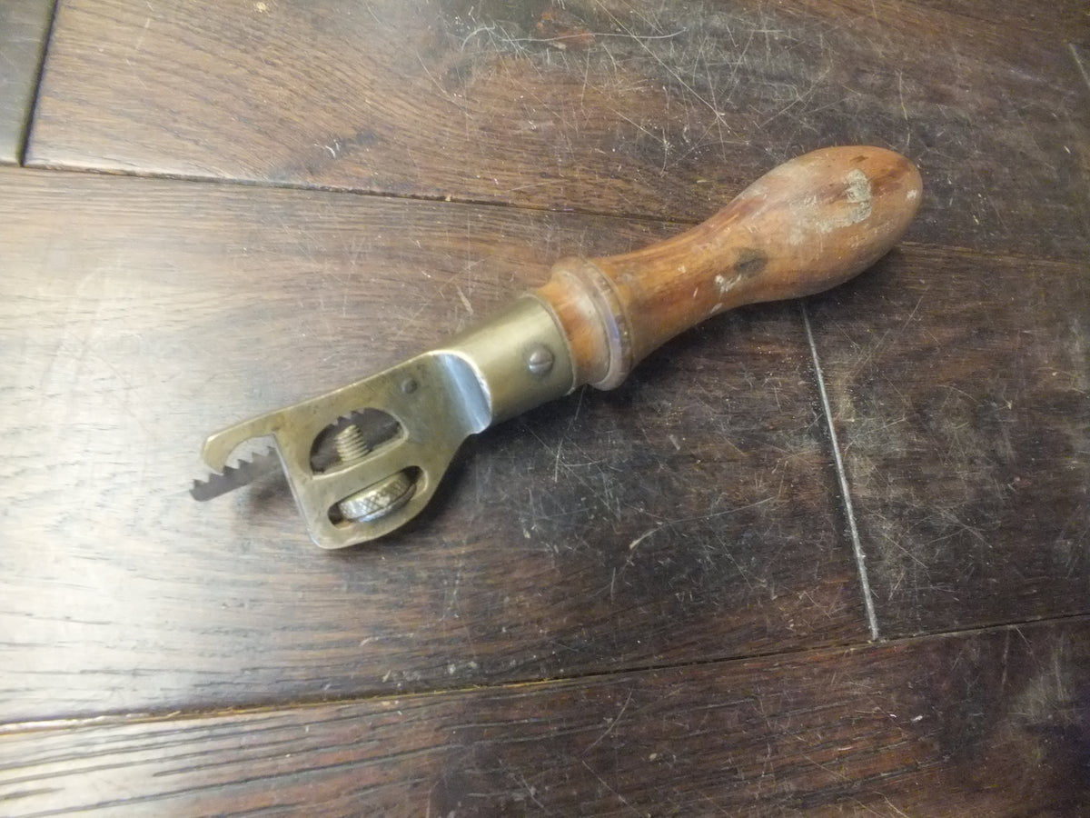 Pad Saw Handle and blade. Cast brass and beech. A tool of great beauty ...